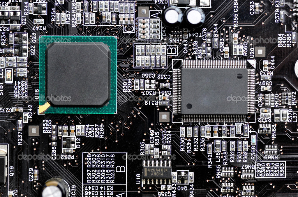 Microchip integrated on motherboard Stock Photo by ©Vbashutskyy 38968011