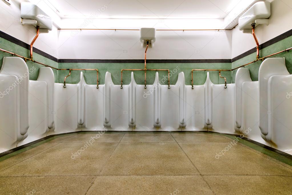 Old fashioned men's urinals Stock Photo by ©tr3gi 16187295