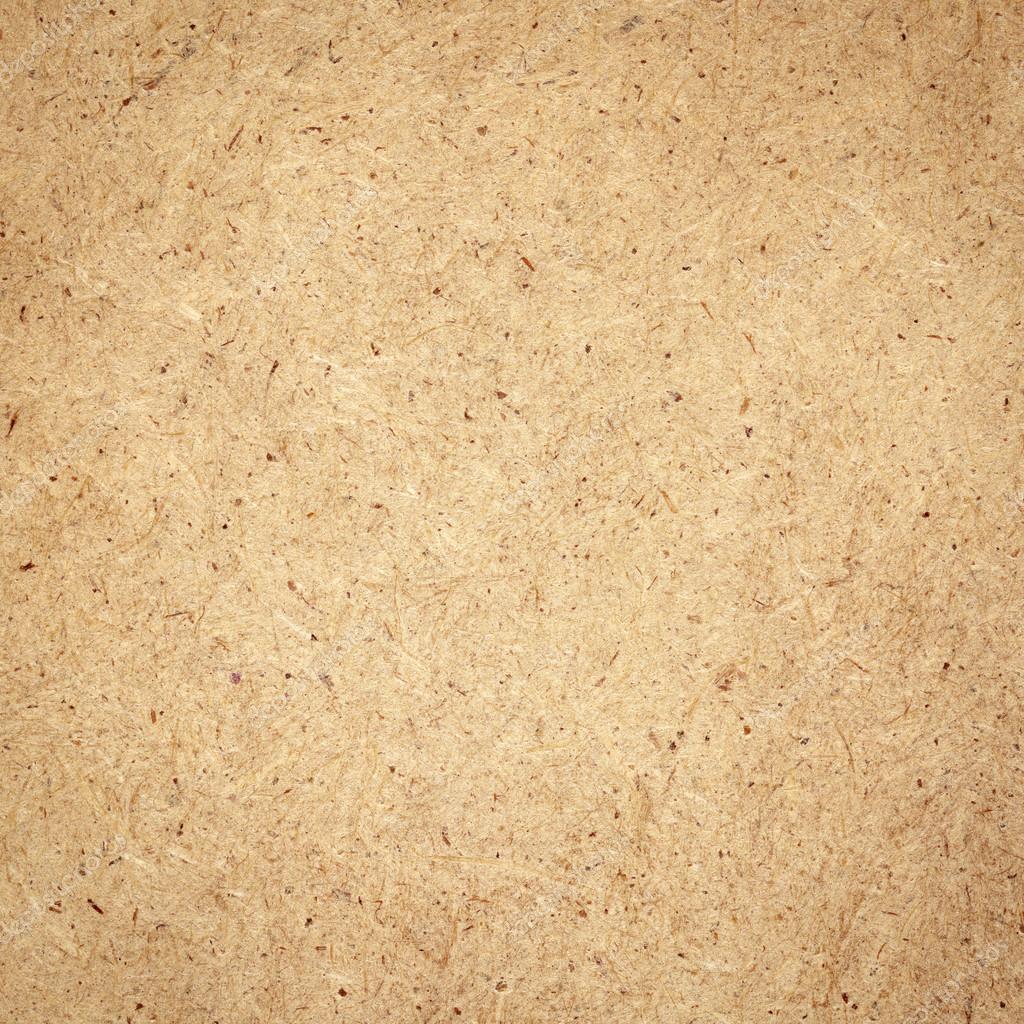 Pressed brown chipboard texture. Wooden background. — Stock Photo #24887657