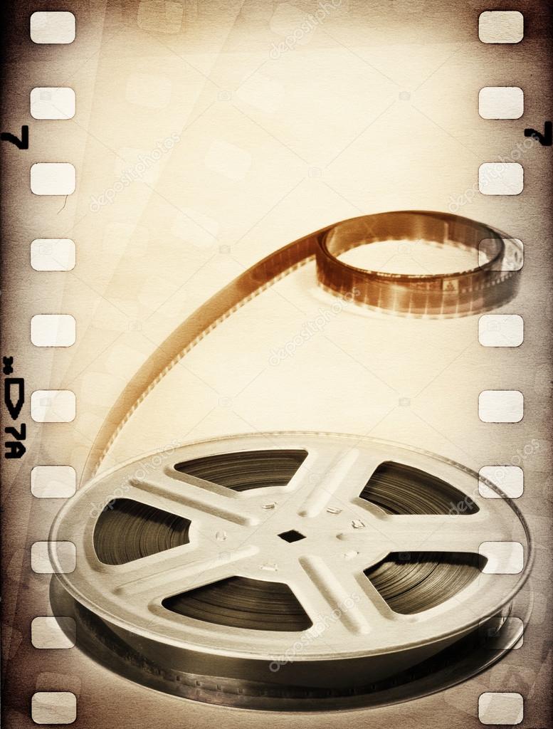 Old motion picture film reel with film strip. Vintage background Stock ...