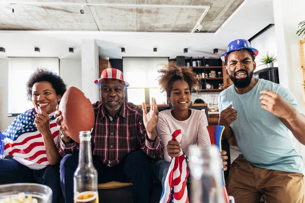 Family Watching American Football