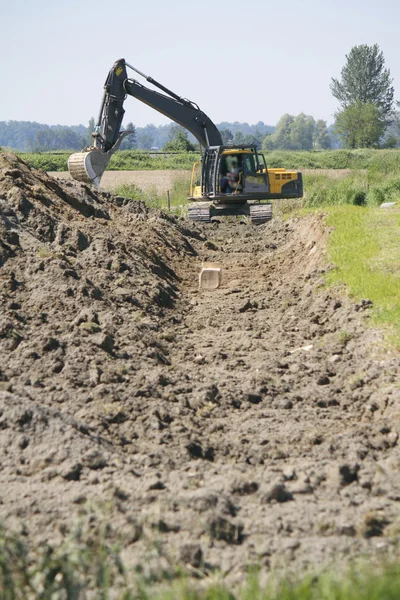 Ditch digging Stock Photos, Royalty Free Ditch digging Images ...