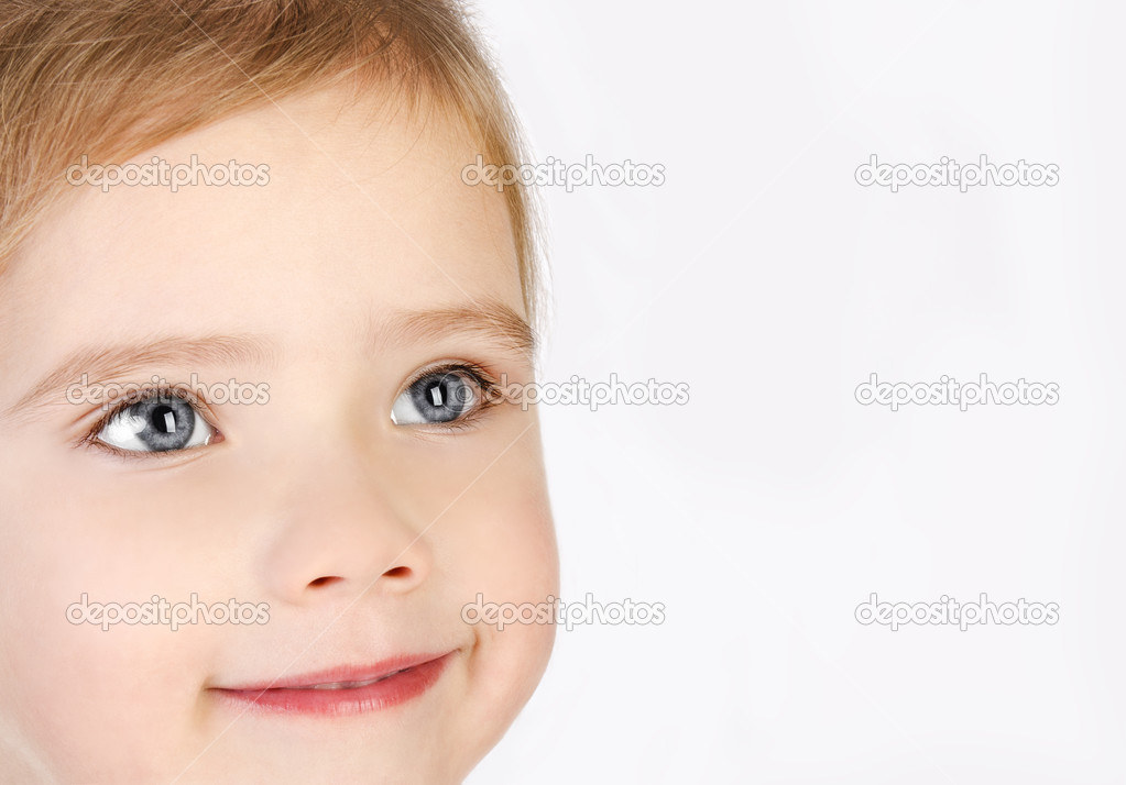 Portrait of smiling cute little girl isolated — Stock Photo © svetamart ...