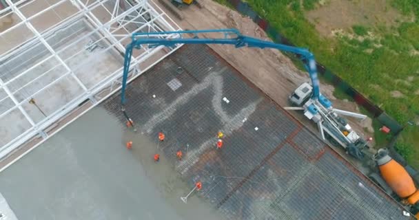 The process of creating a concrete floor. Pouring the formwork with ...