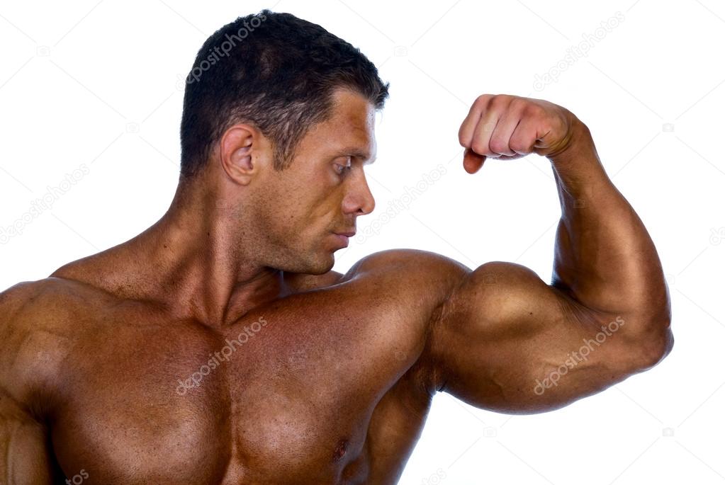Bodybuilder showing his muscles — Stock Photo © kanzefar #18295395
