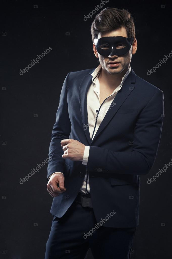 Handsome man in mask — Stock Photo © aarrttuurr #37953905