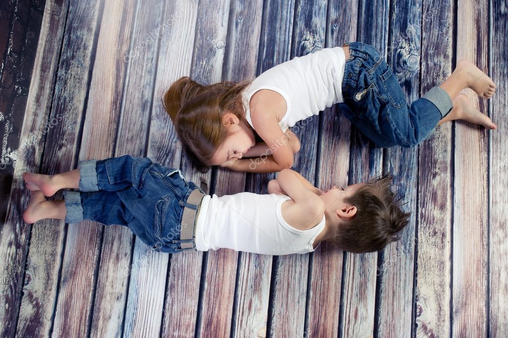 Two happy kids in studio Stock Photo by ©aarrttuurr 41084669