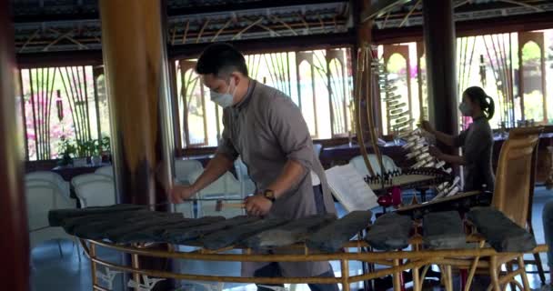 Asian musicians play the temple in honor of the Chinese New Year, a ...