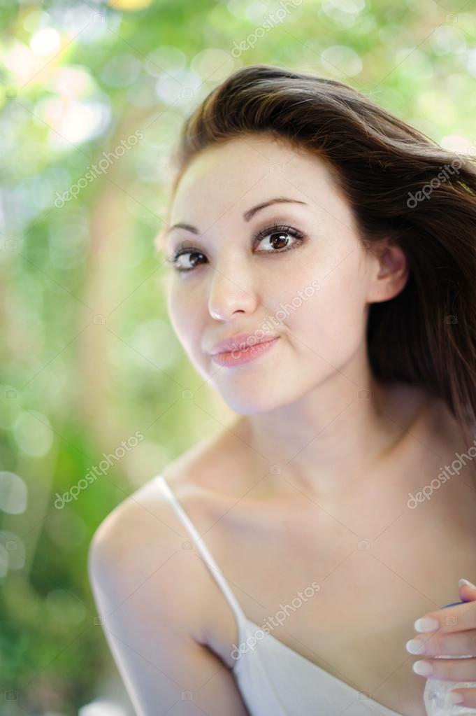 Attractive Asian Female looking expressionless — Stock Photo ...