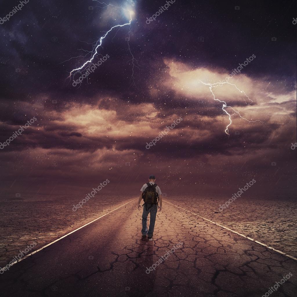 Man Walking In Storm