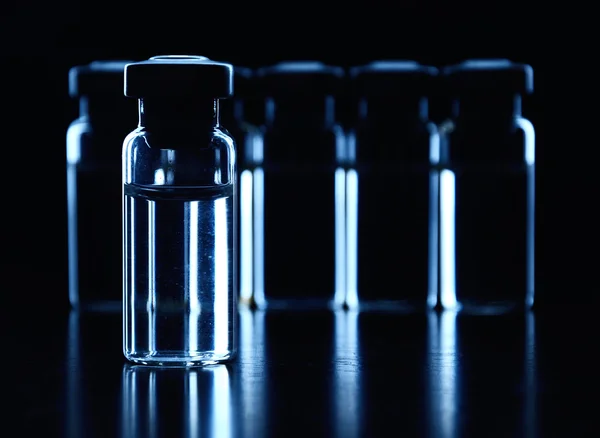 Small vials Stock Photos, Royalty Free Small vials Images | Depositphotos