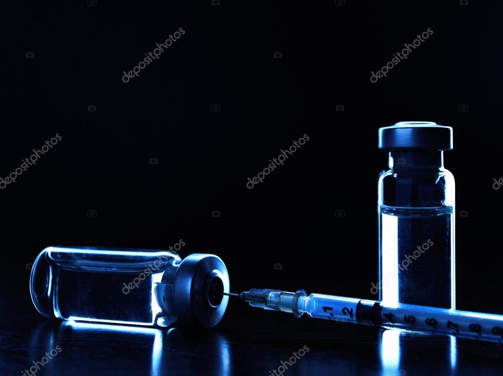 Vials of medications with syringe and needle. Stock Photo by ©itsmejust ...