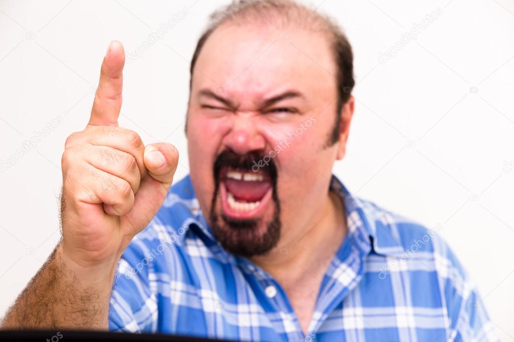 Angry middle-aged man screaming and threatening — Stock Photo ...
