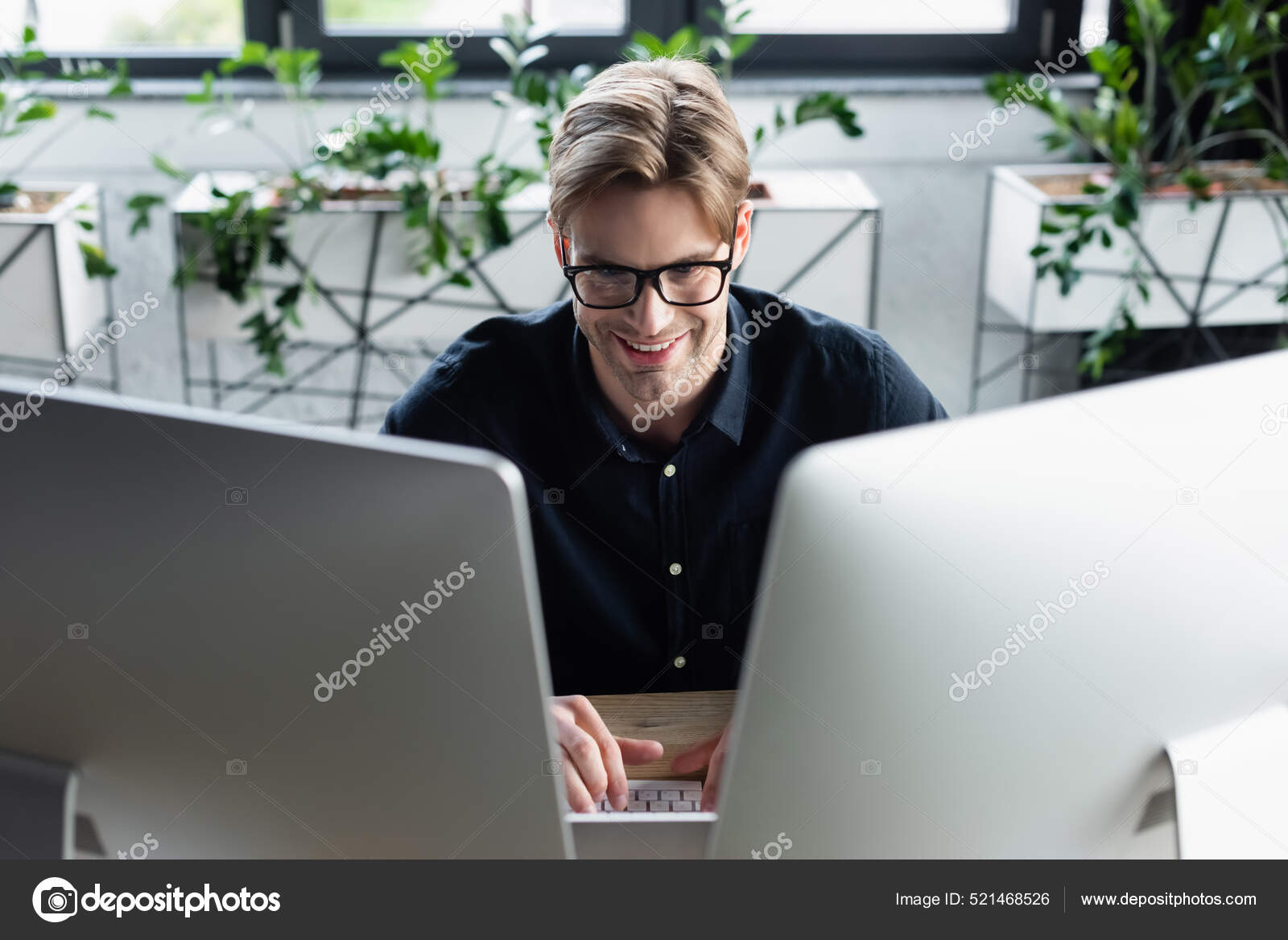 Happy Programmer Eyeglasses Using Computers Office Stock Photo by ©IgorVetushko 521468526