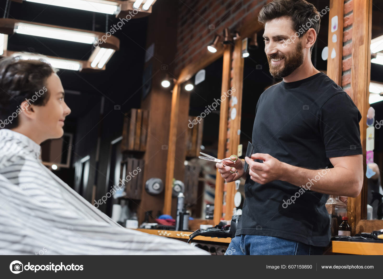 Smiling Barber Holding Comb Scissors Blurred Teenager Beauty Salon ...