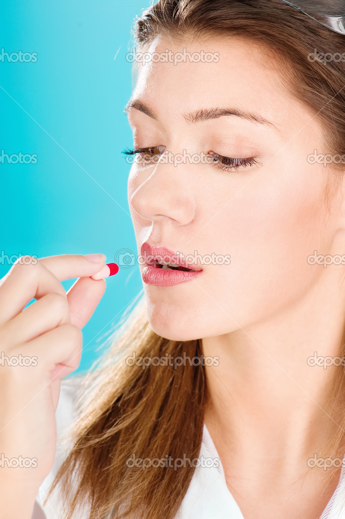 Woman taking red pill — Stock Photo © imarin #28732027 Woman taking red pill — Stock Photo © imarin #28732027