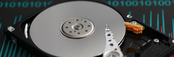Close-up of disassembled hard drive from computer hdd and reader arm ...