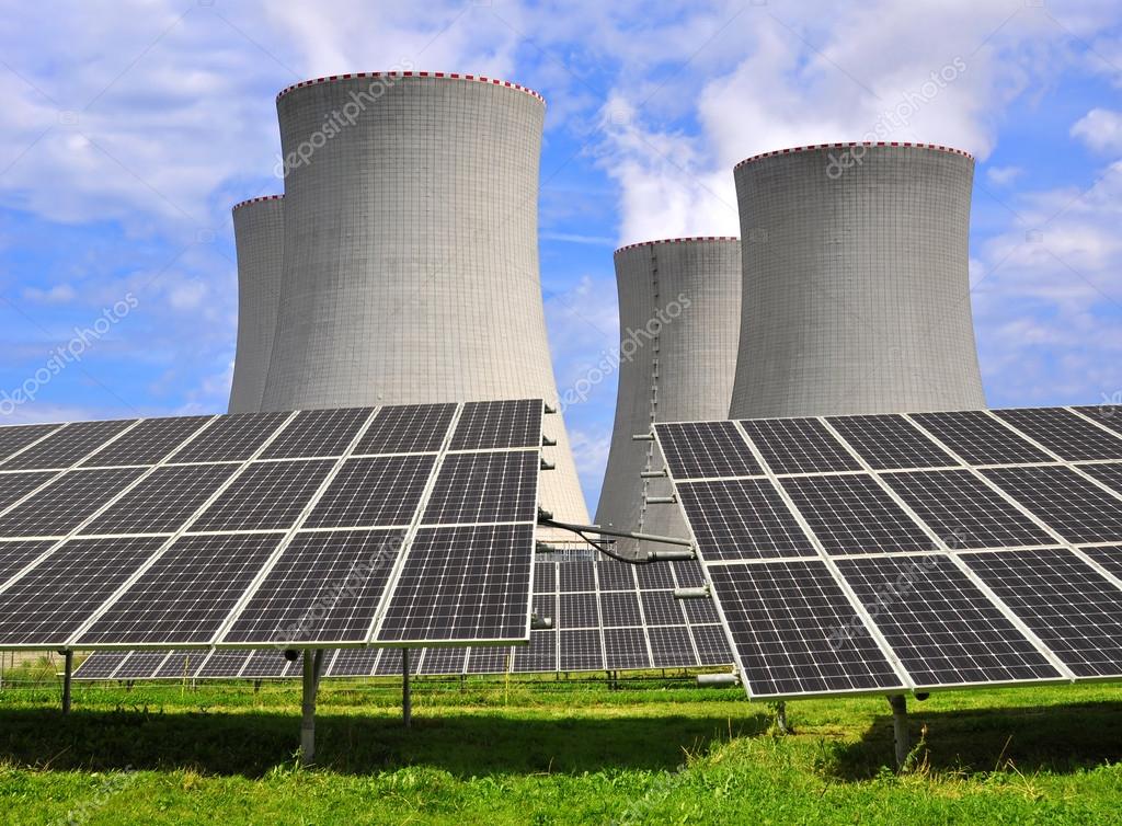 Solar energy panels before a nuclear power plant Stock Photo by ©vencav ...