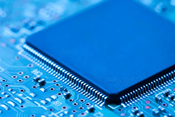 Close-up of electronic circuit board with chip - Stock Image - Everypixel