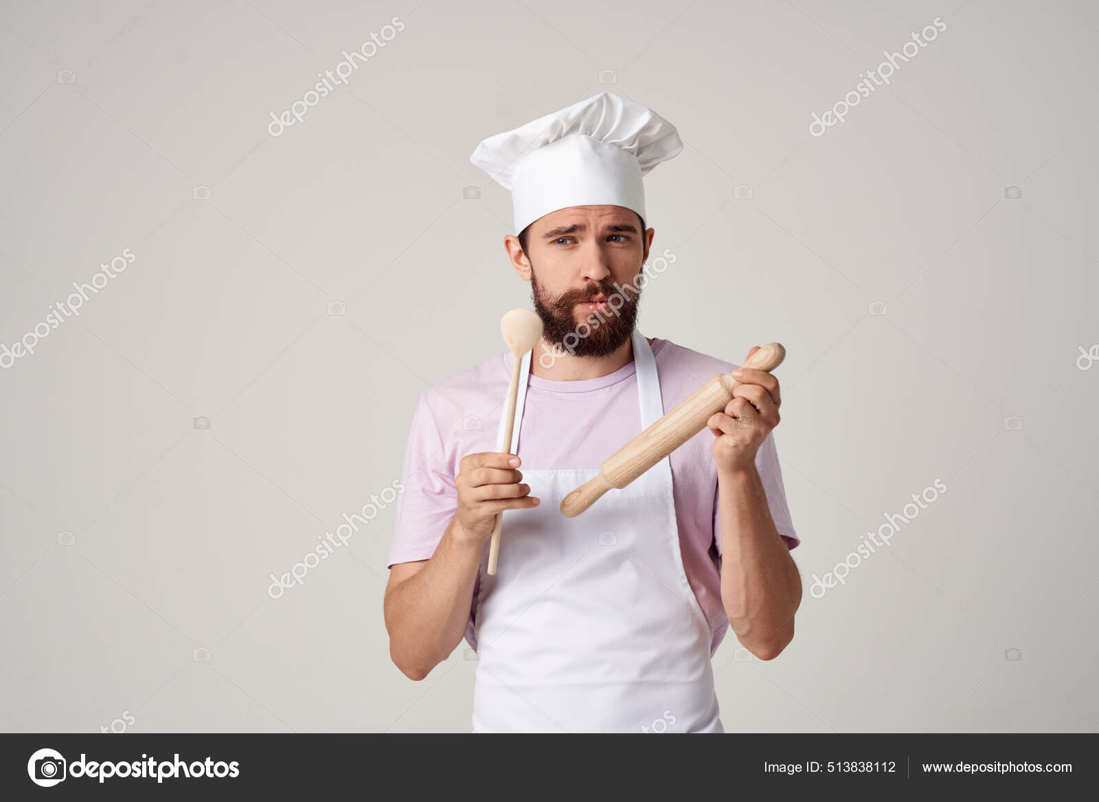 Male chef with a cap on his head tasting food professional cooking ...