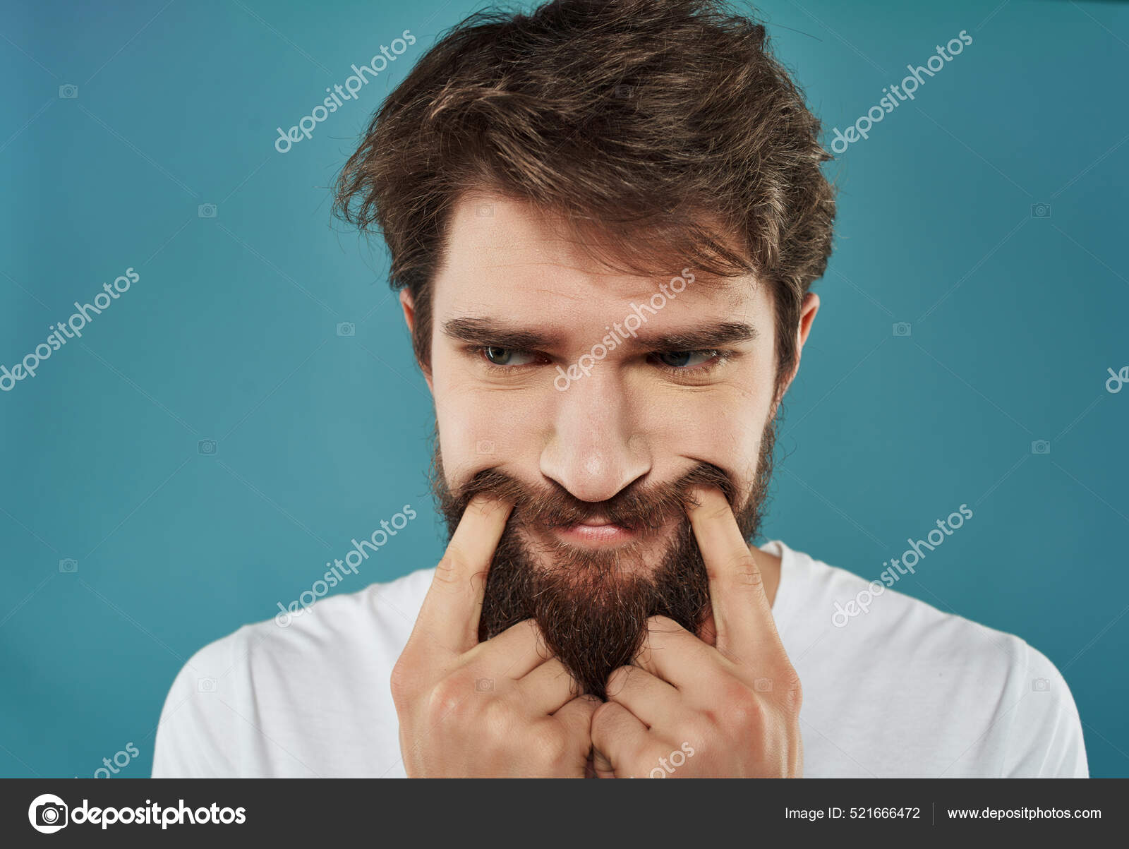 Emotional man in a white t-shirt hand gestures anger Studio — Stock ...