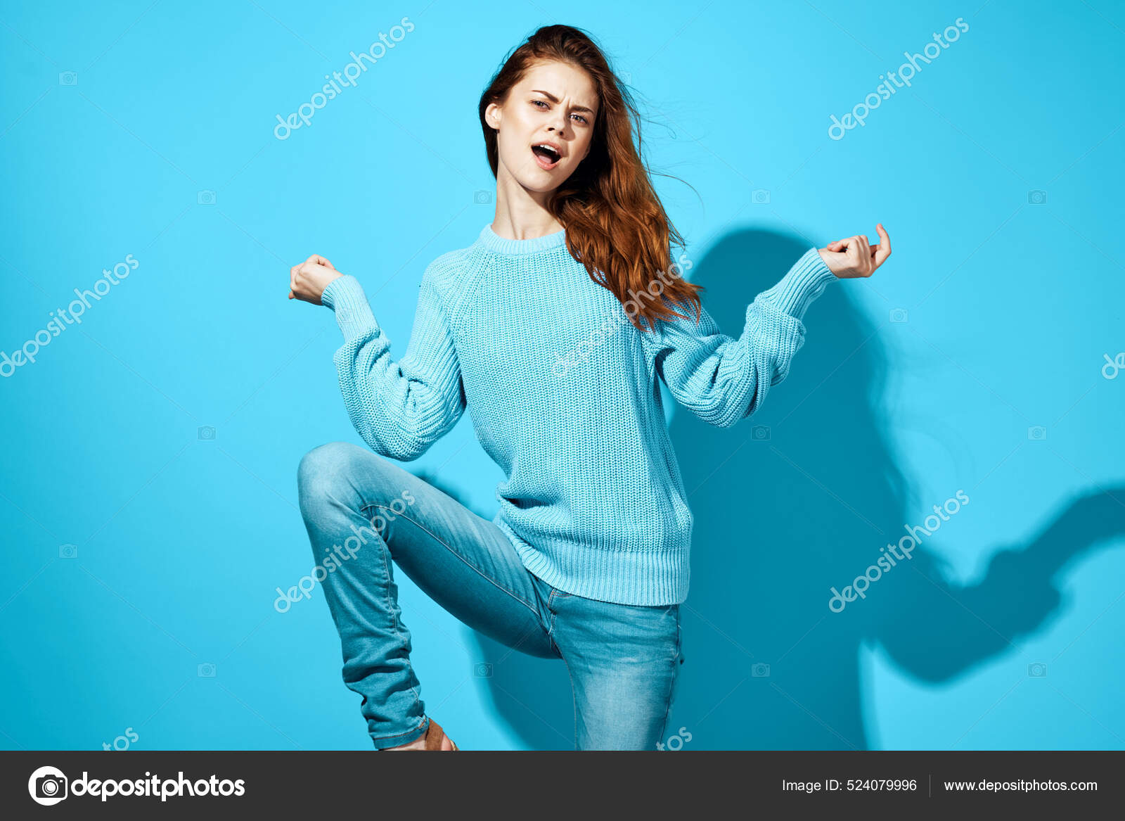 Pretty Woman Posing Blue Background — Stock Photo © ShotStudio #524079996