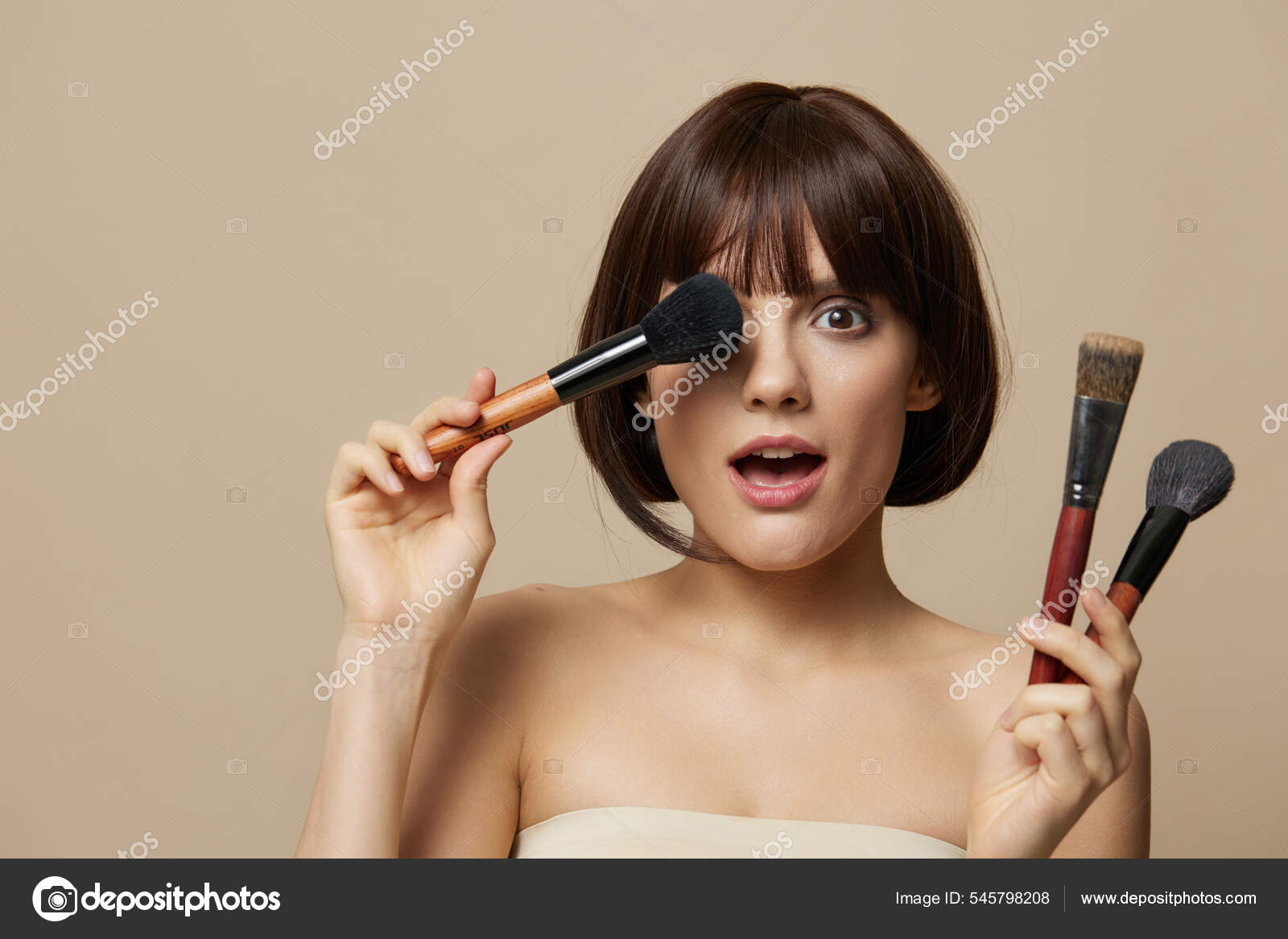 Beautiful woman makeup brushes in hand model makeup posing isolated ...