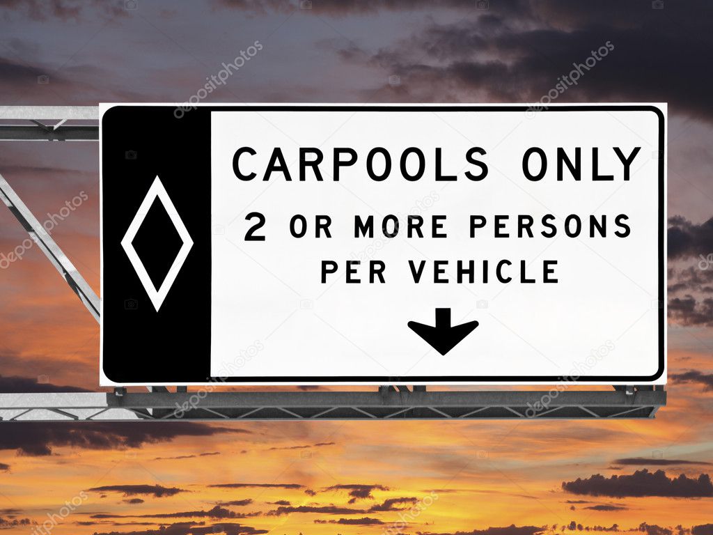 Overhead Freeway Carpool Only Sign with Sunset Sky Stock Photo by ...