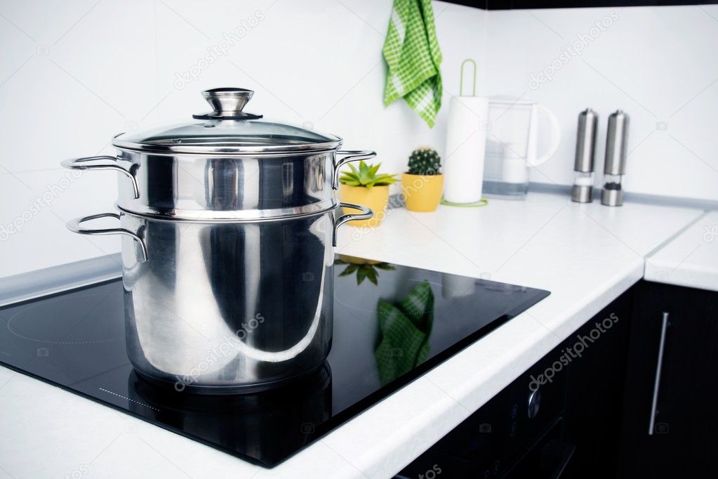 Big pot in modern kitchen with induction stove — Stock Photo ...