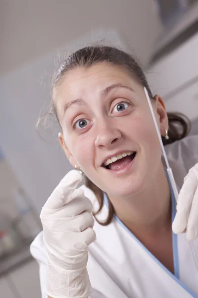 Woman in lab making funny faces - Stock Image - Everypixel