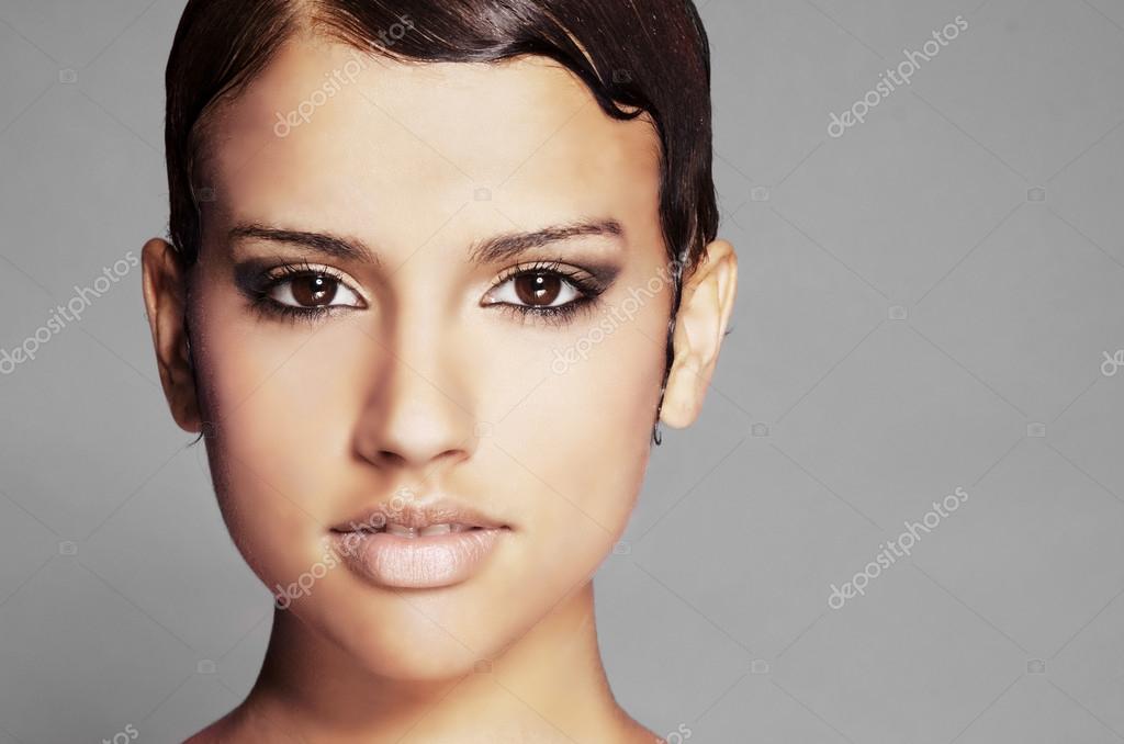Beautiful young multi ethnic woman's face — Stock Photo © AVFC #19039527