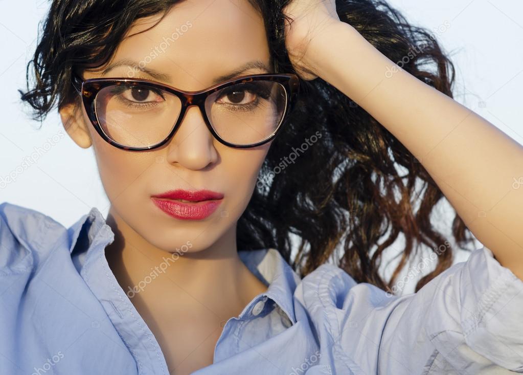 Woman wearing retro vintage eye glasses Stock Photo by ©AVFC 25590967