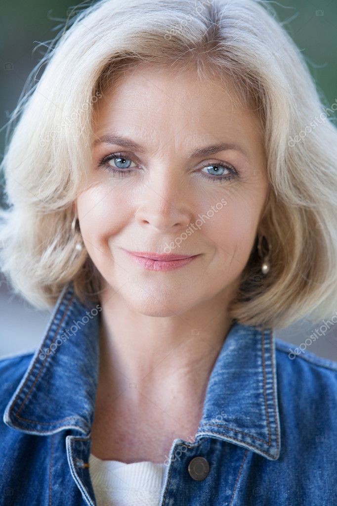 Beautiful Blonde Middle Aged Woman — Stock Photo © DeborahKolb #18531175 Beautiful Blonde Middle Aged Woman — Stock Photo © DeborahKolb #18531175