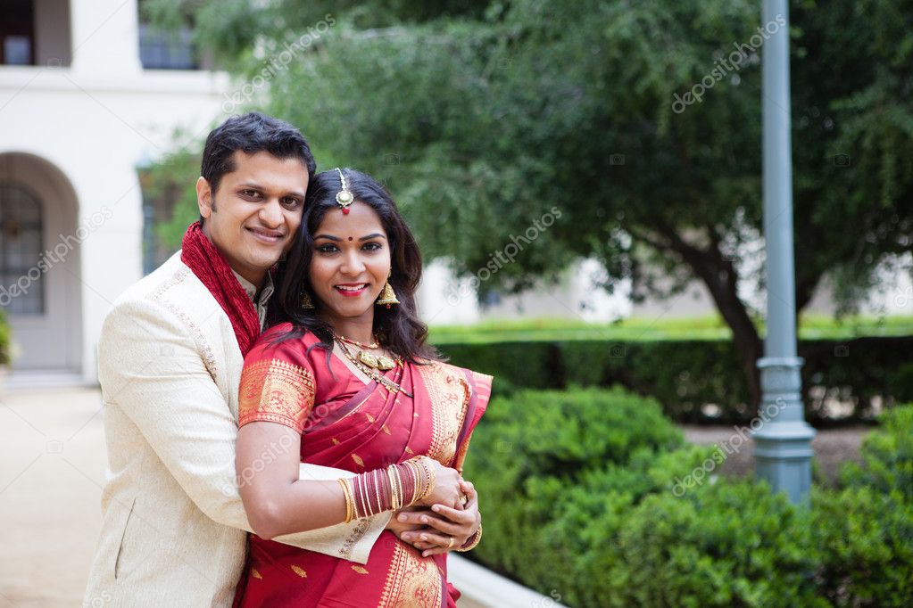 Attractive Indian bride and groom — Stock Photo © DeborahKolb #24469815 Attractive Indian bride and groom — Stock Photo © DeborahKolb #24469815