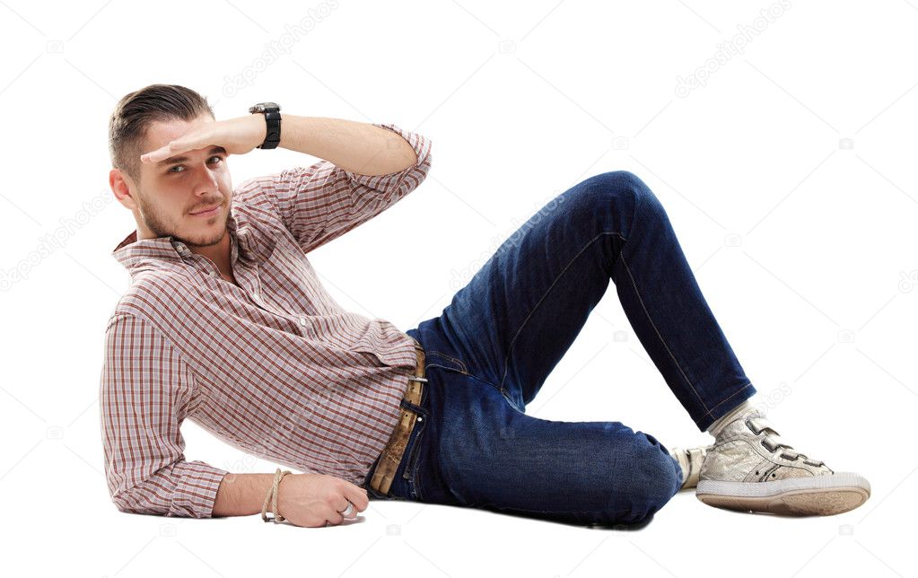 Flirtatious man sitting on the floor Stock Photo by ©opolja 39611595