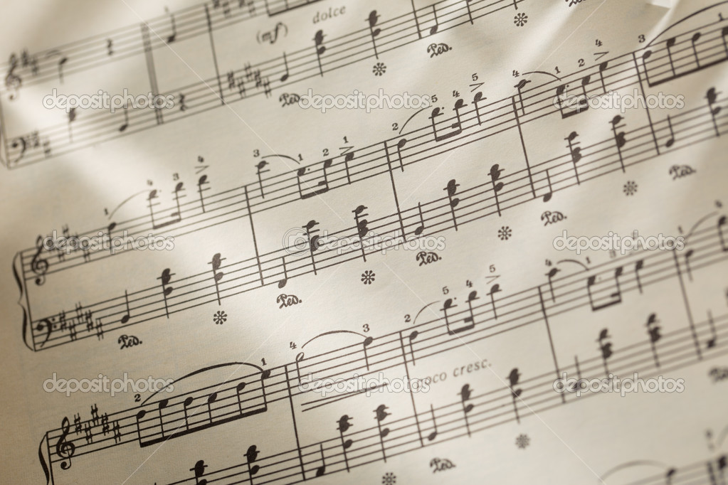 Music notes on paper background Stock Photo by ©Garsya 12292445