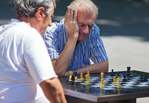 Old men playing chess – Stock Editorial Photo © paulprescott #38238063
