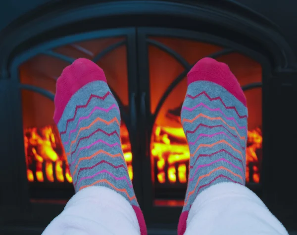 A Pair of Feet and a Cozy Fire - Stock Image - Everypixel