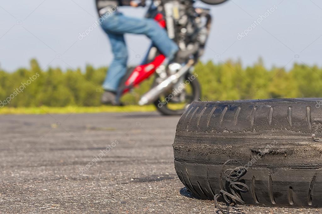 Motorcycle Tricks on unused runway — Stock Photo © ScorpionPL #36284821
