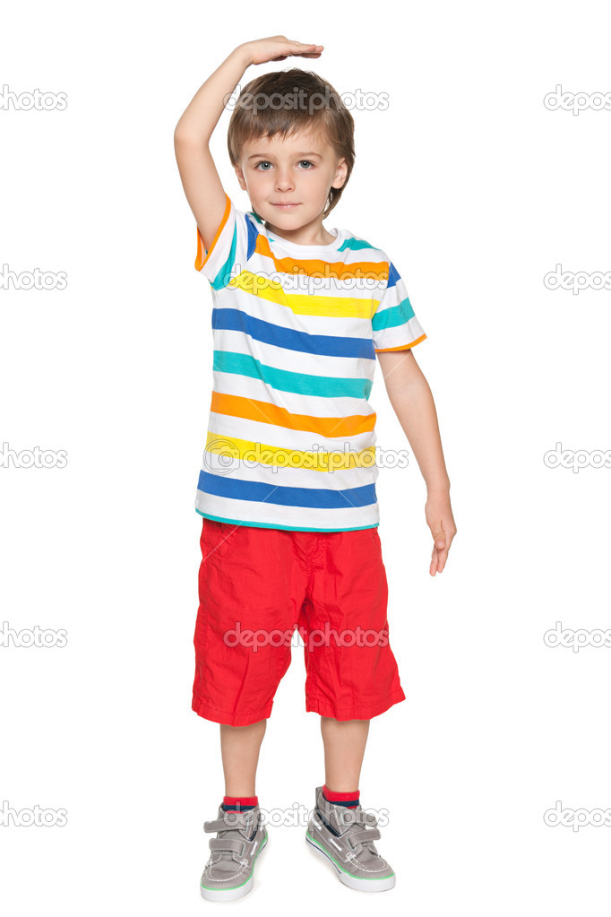 Little boy shows how he is tall — Stock Photo © SergiyN #39189389