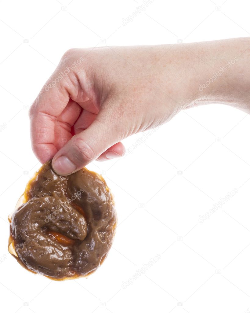 Hand holding fake excrement — Stock Photo © Taigi #35741507