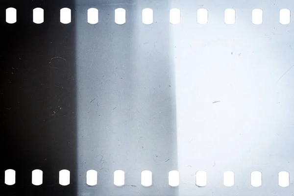 Dusty and grungy 35mm film texture or surface. Perforated scratched ...