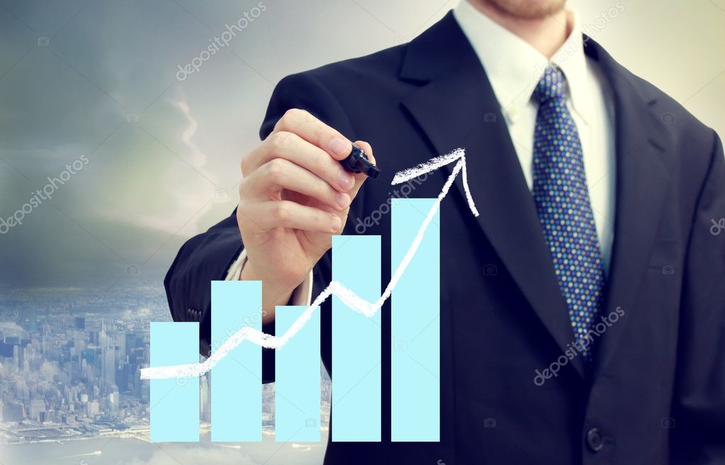 Business Man with Chart Showing Growth Stock Photo by ©Melpomene 13773483
