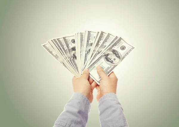 Business Man Displaying a Spread of Cash Stock Photo by ©Melpomene 28952811