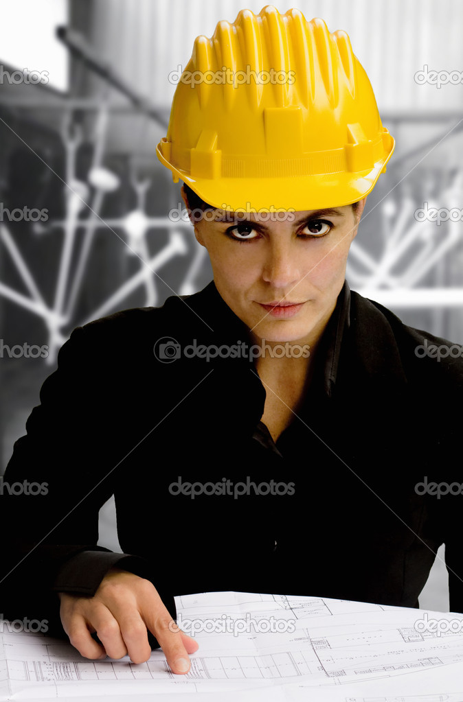 Female foreman with industrial background Stock Photo by ©TTLmedia 13919460