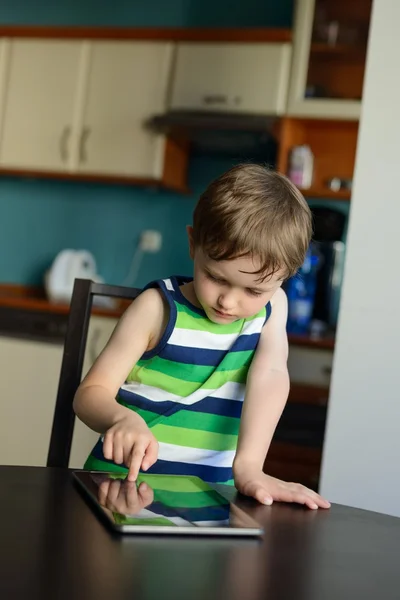 Preschooler uses tablet - Stock Image - Everypixel