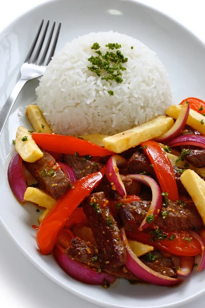 Lomo saltado, peruvian cuisine — Stock Photo © asimojet #12162798