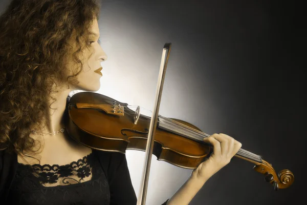 Violin playing Stock Photo by ©alenavlad 8414113