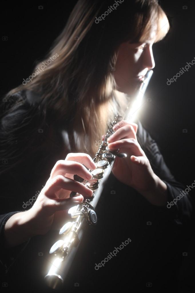 Flute playing flutist musician performer — Stock Photo © alenavlad ...
