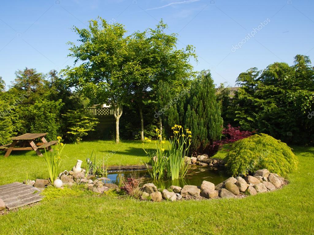 Beautiful classical garden fish pond gardening background Stock Photo ...